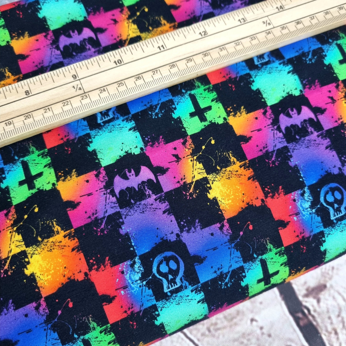 1m BOLT END. Skull bat checkerboard 220gsm jersey fabrics – BlueMothFabrics